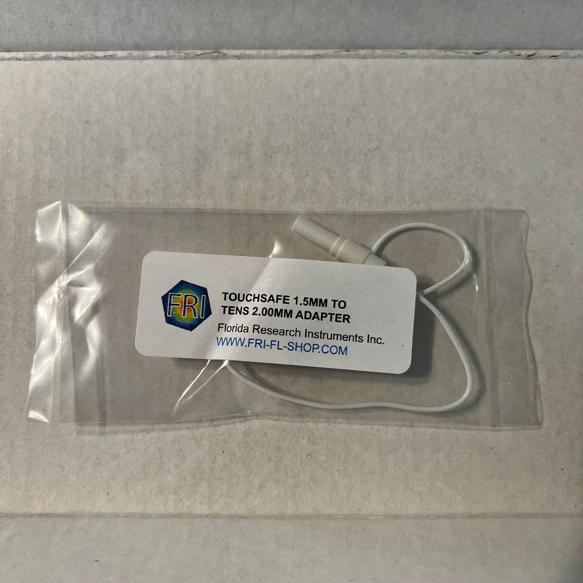 Touchsafe to TENS adapter (1.5mm jack, 2.0mm plug) – Florida Research ...